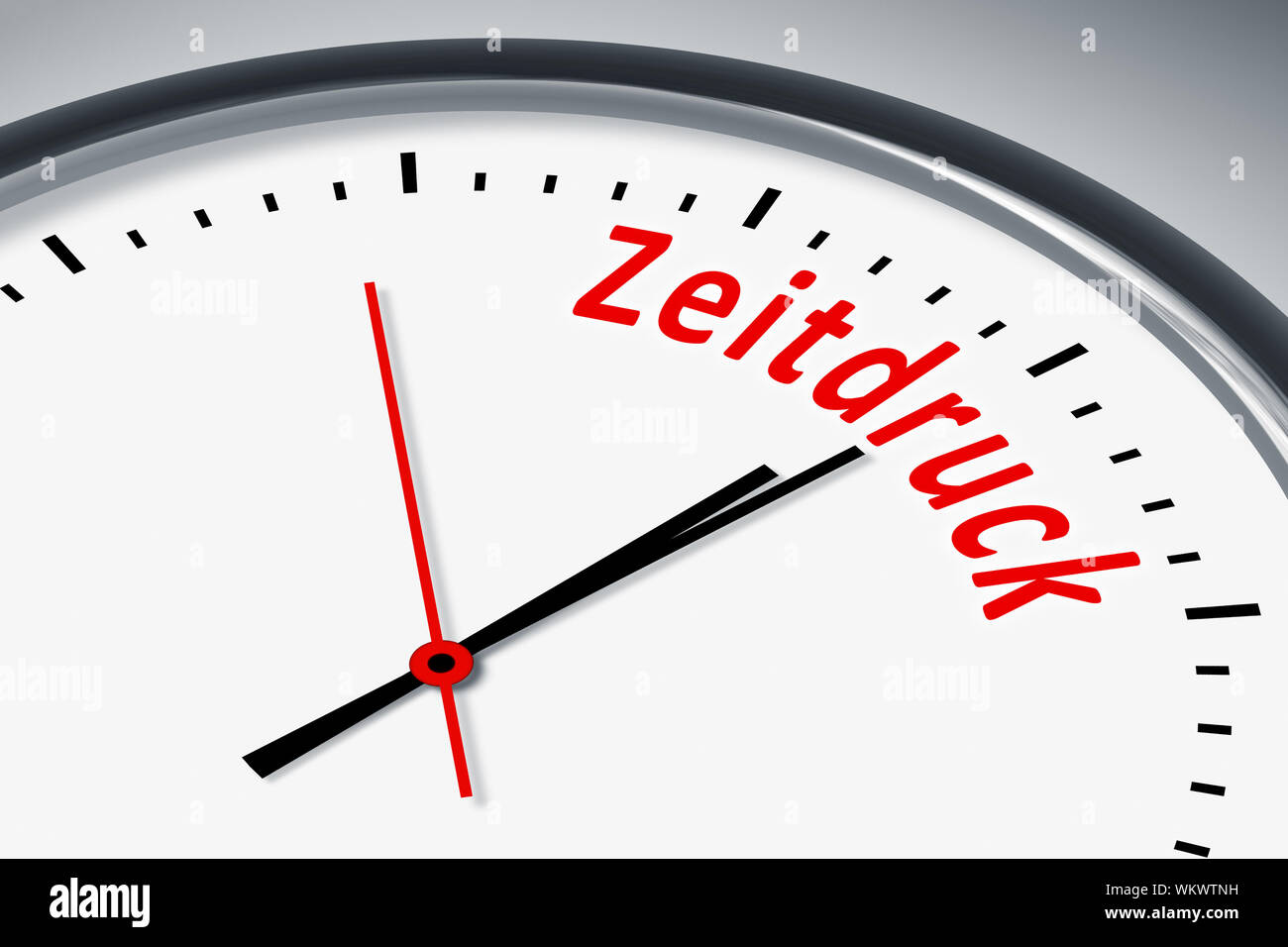 Eine Uhr mit Text Zeitdruck Stock Photo - Alamy