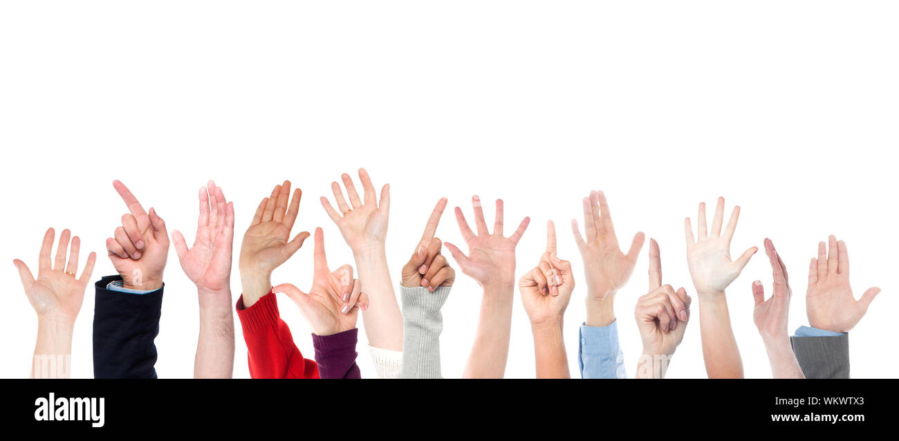 Hands raised up. Isolated over white background Stock Photo - Alamy