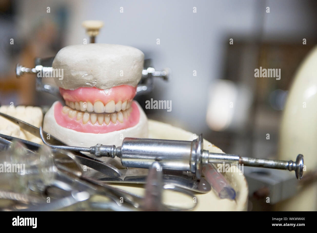 old dentures and metal work tools from the dentist Stock Photo - Alamy