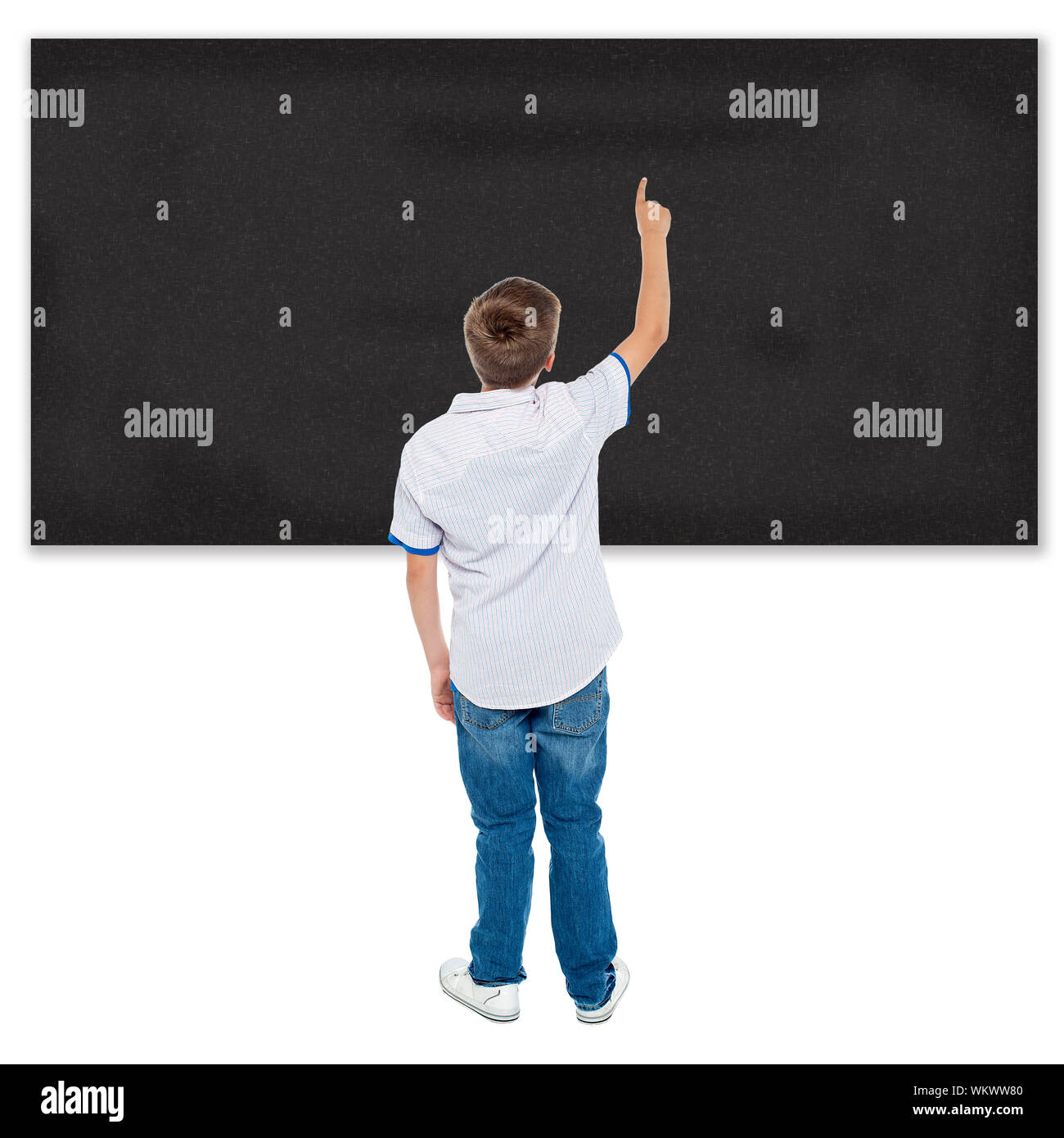 Rear view of a student pointing on a blackboard Stock Photo - Alamy