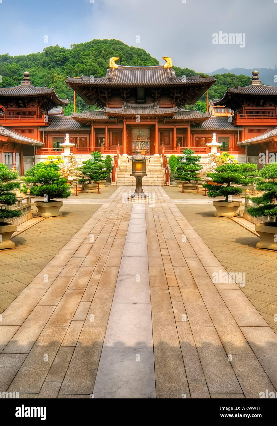 Road toward Chinese traditional ancient temple and lamp in front of ...