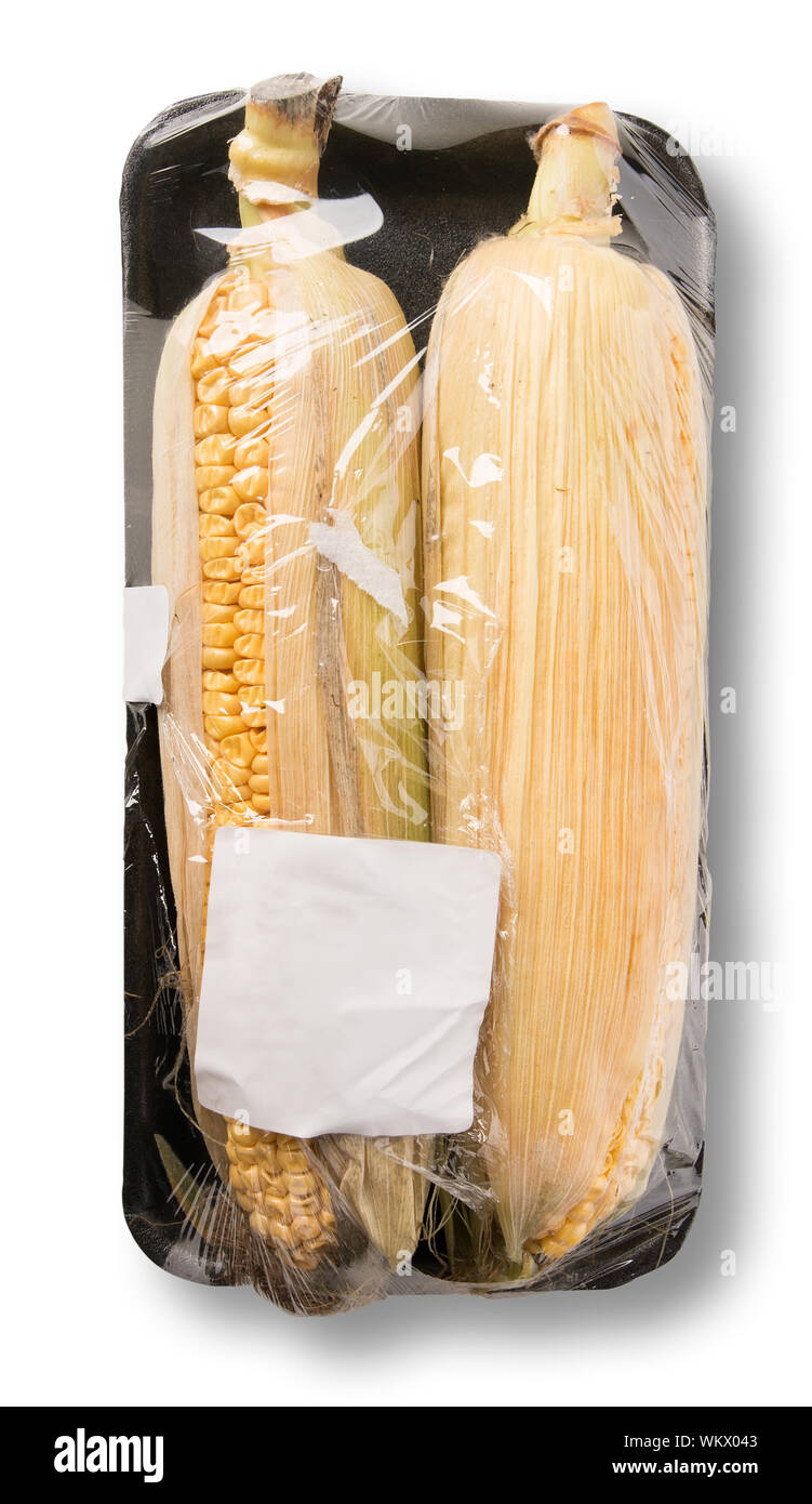 Corn in packing isolated on a white background Stock Photo - Alamy