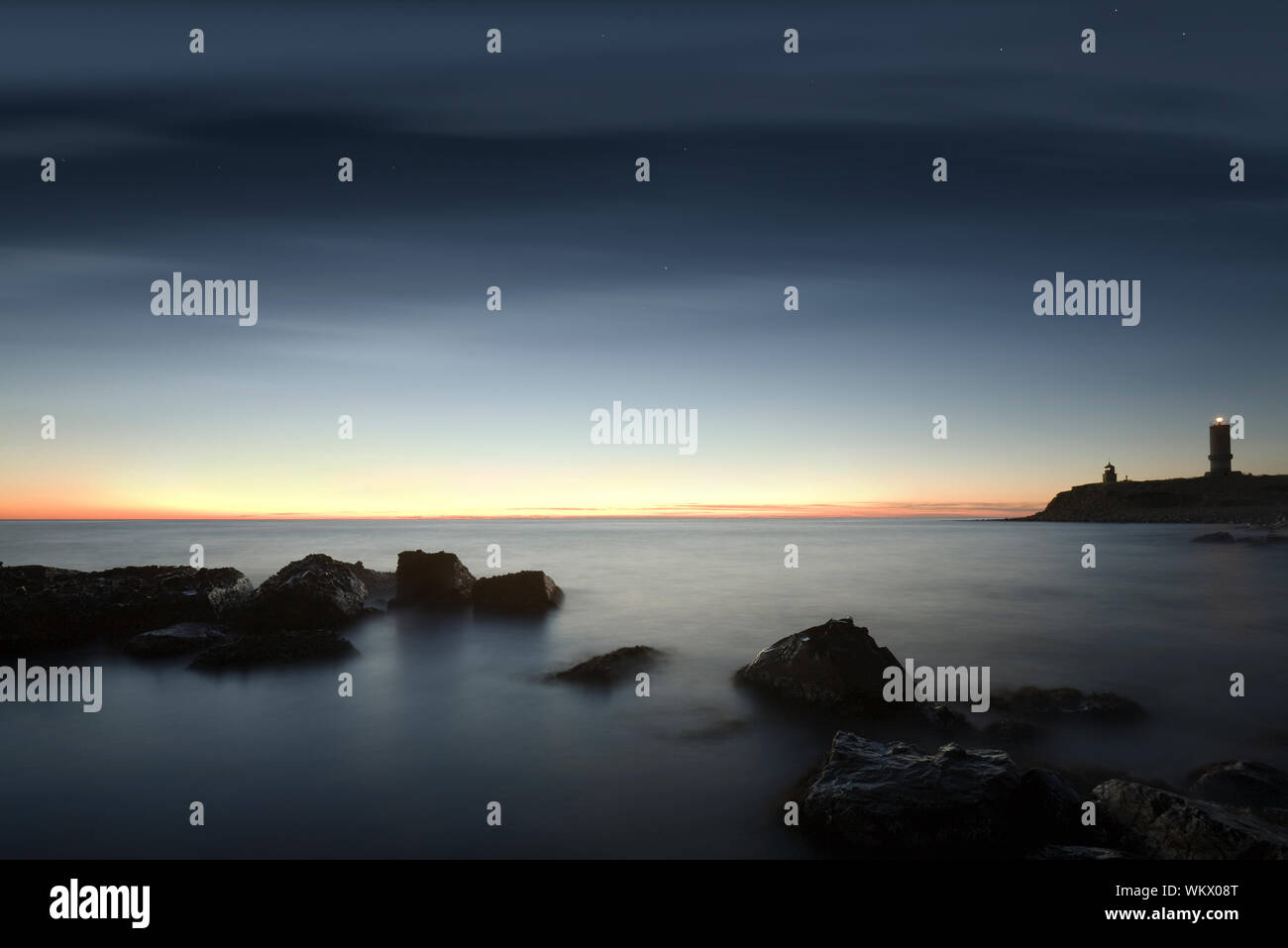 Seacoast. A decline. The sky in the light of the moon and the sun. Long ...