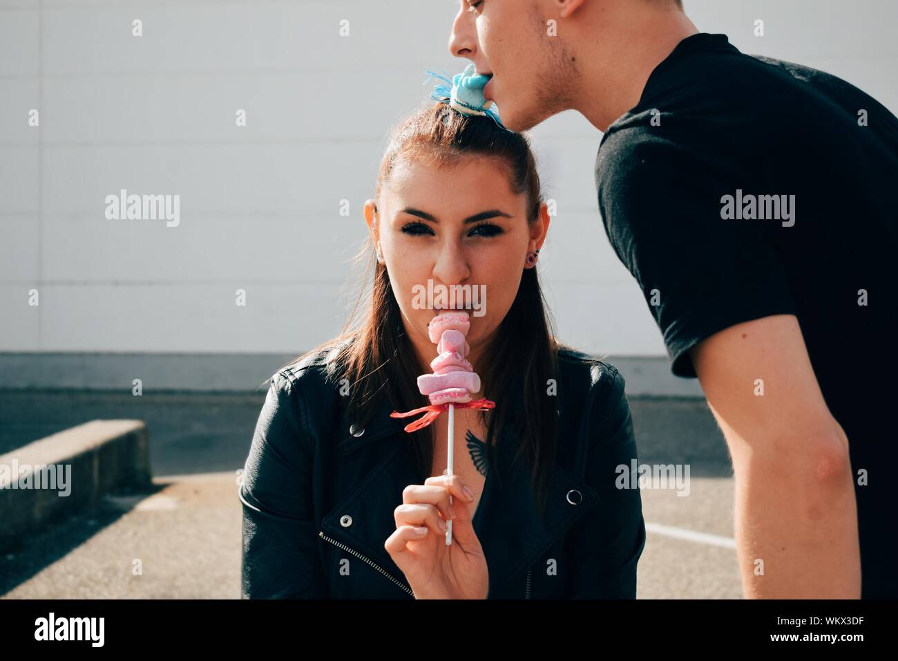Two friends eating ice cream hi-res stock photography and images - Alamy