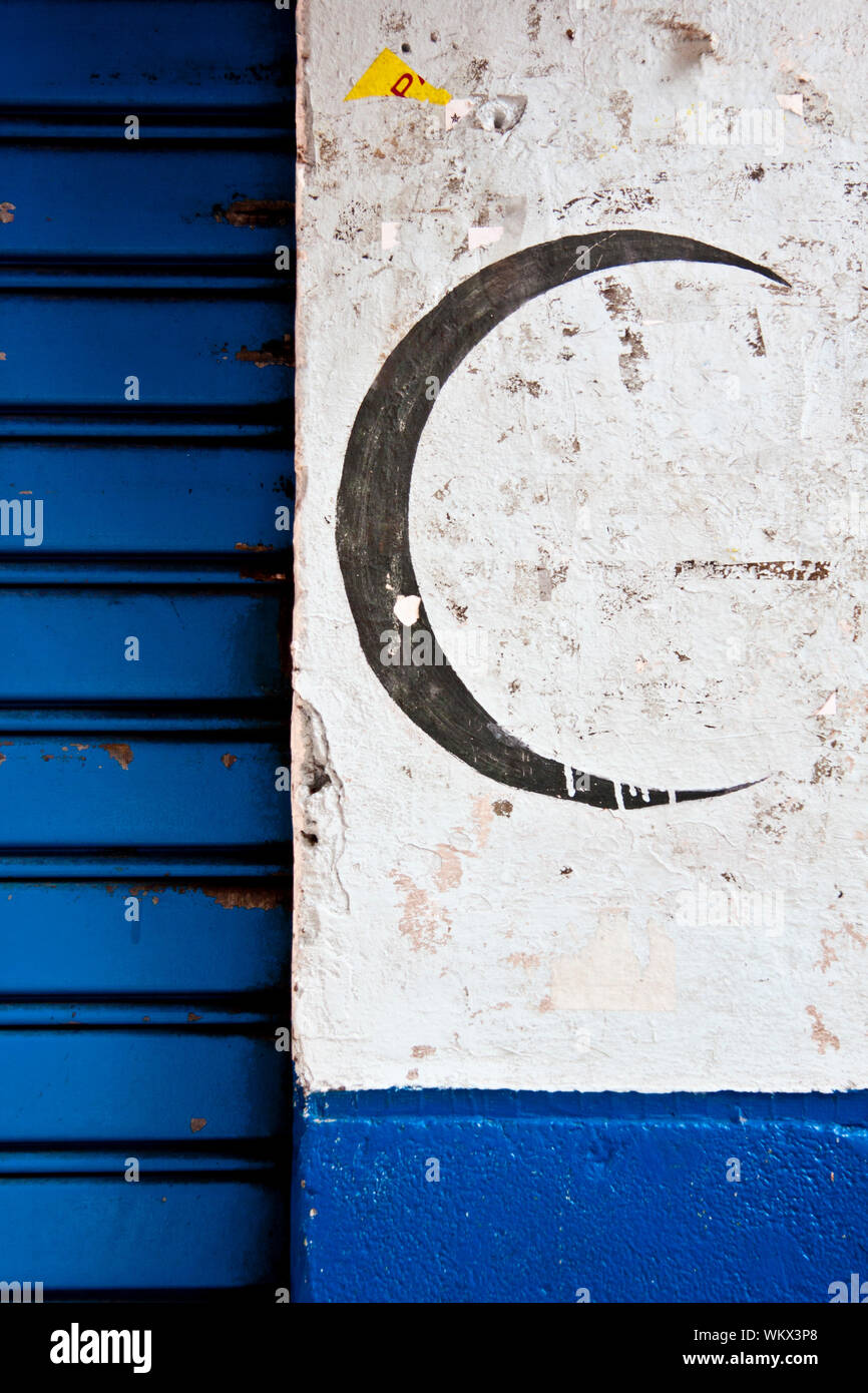 Half moon graffiti- islamic sign for pharmacy Stock Photo - Alamy
