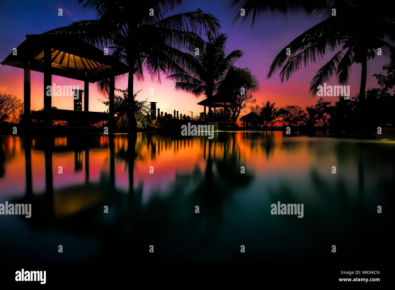 Beautiful sunset at a beach resort in the tropics Stock Photo - Alamy