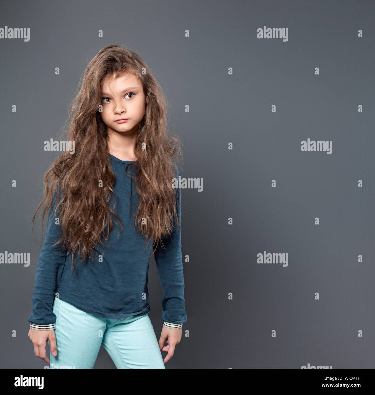 Thinking pupil kid girl thinking and have an idea with finger under the ...