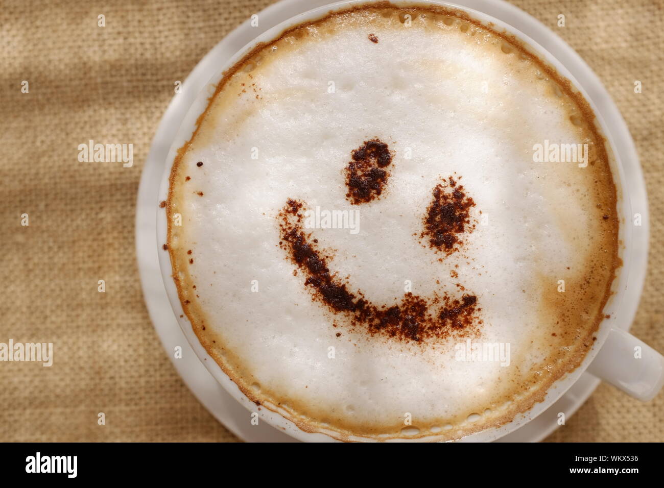 Coffee cappuccino foam or chocolate smiling happy face Stock Photo - Alamy