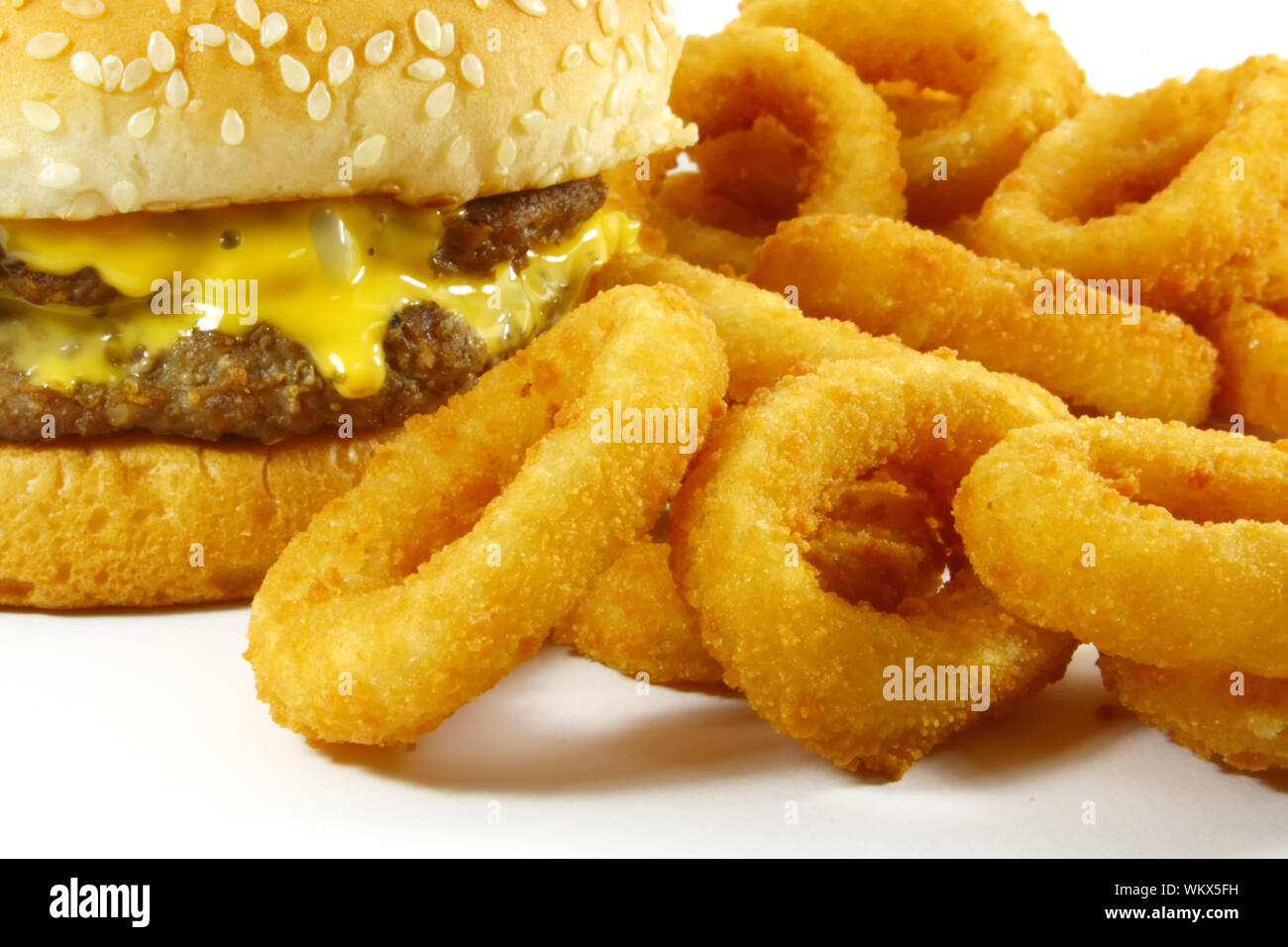Hamburger and Onion Rings Fast Food Meal Stock Photo - Alamy