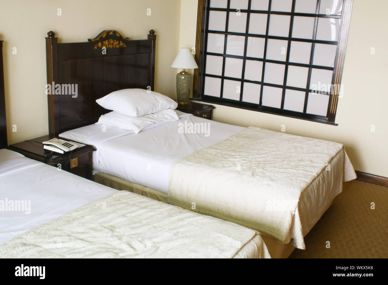 Generic Hotel Bed Room With Sunlight Coming In Stock Photo - Alamy