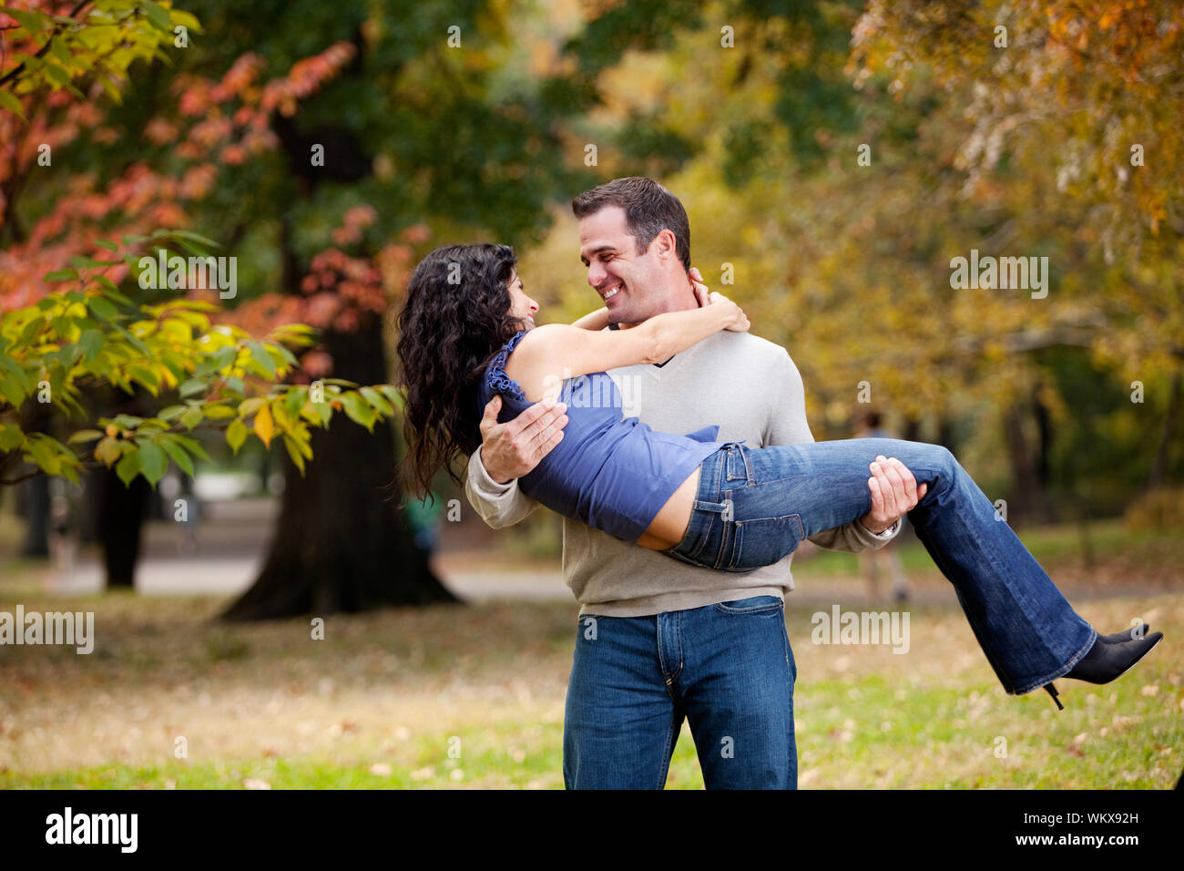 Man Holding Woman Stock Photo - Alamy
