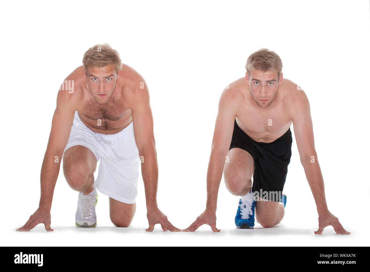 two sprinters getting ready to start the race - isolated on white Stock ...