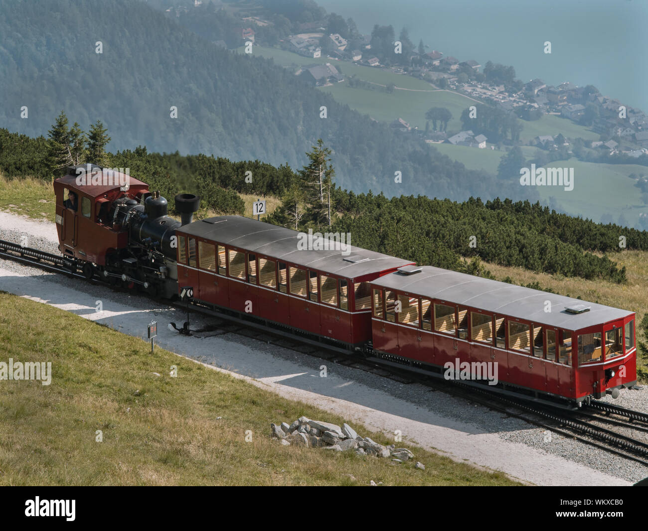 Old rack and pinion railway with pushing steam locomotive in Austria ...