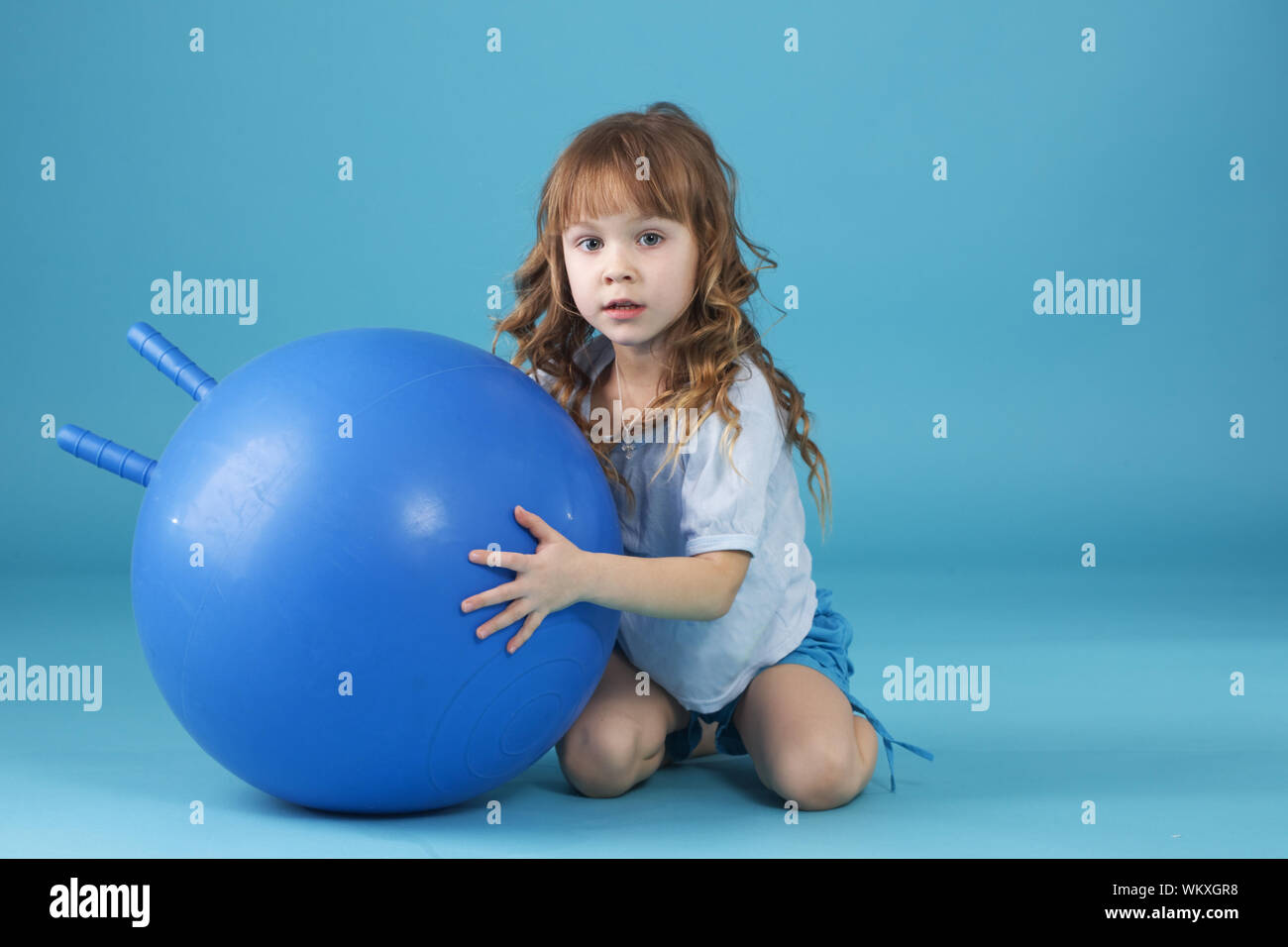Kid ball hi-res stock photography and images - Alamy