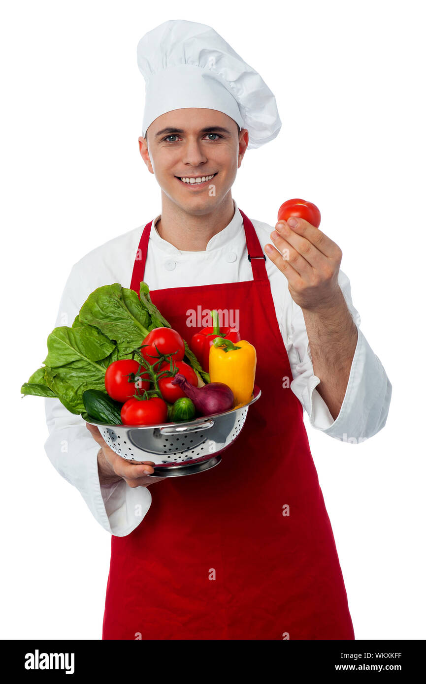 Male chef washing vegetables in commercial kitchen sink Stock Photo - Alamy