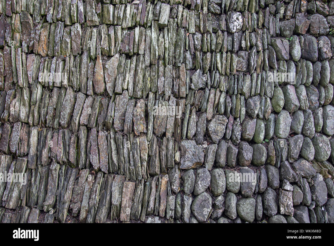 Historic dry stone wall built in traditional Cornish style in England ...