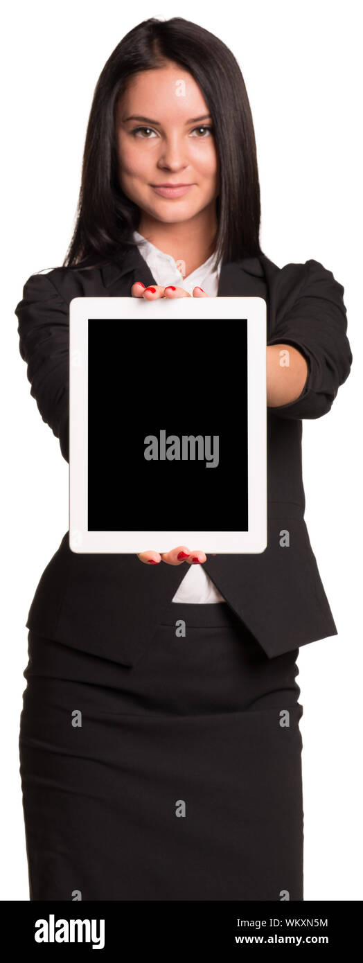 Beautiful businesswomen in suit showing tablet pc. Isolated on white ...