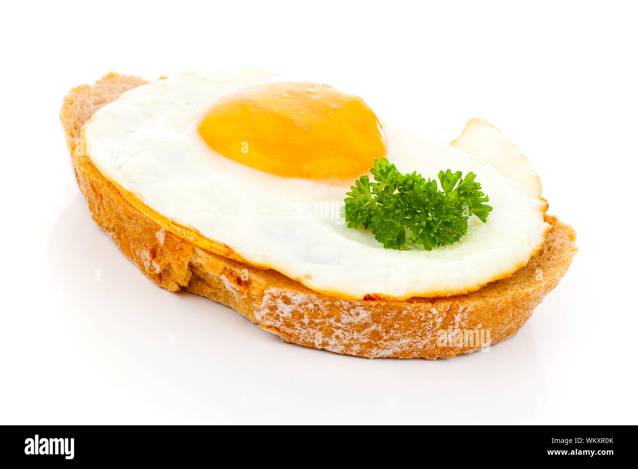 Fried eggs on crusty toasted bread Stock Photo - Alamy