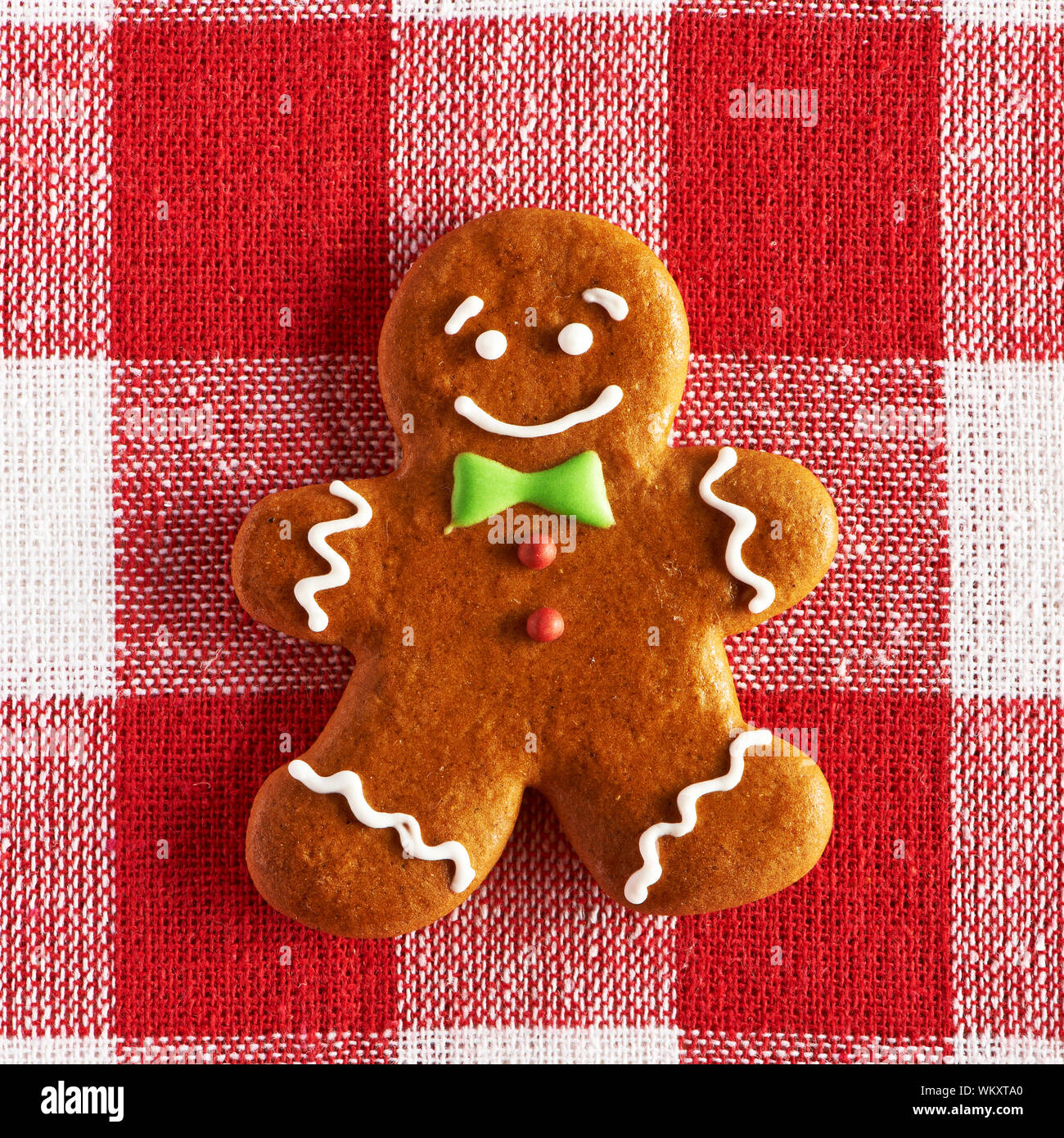 Christmas homemade gingerbread man on tablecloth Stock Photo - Alamy
