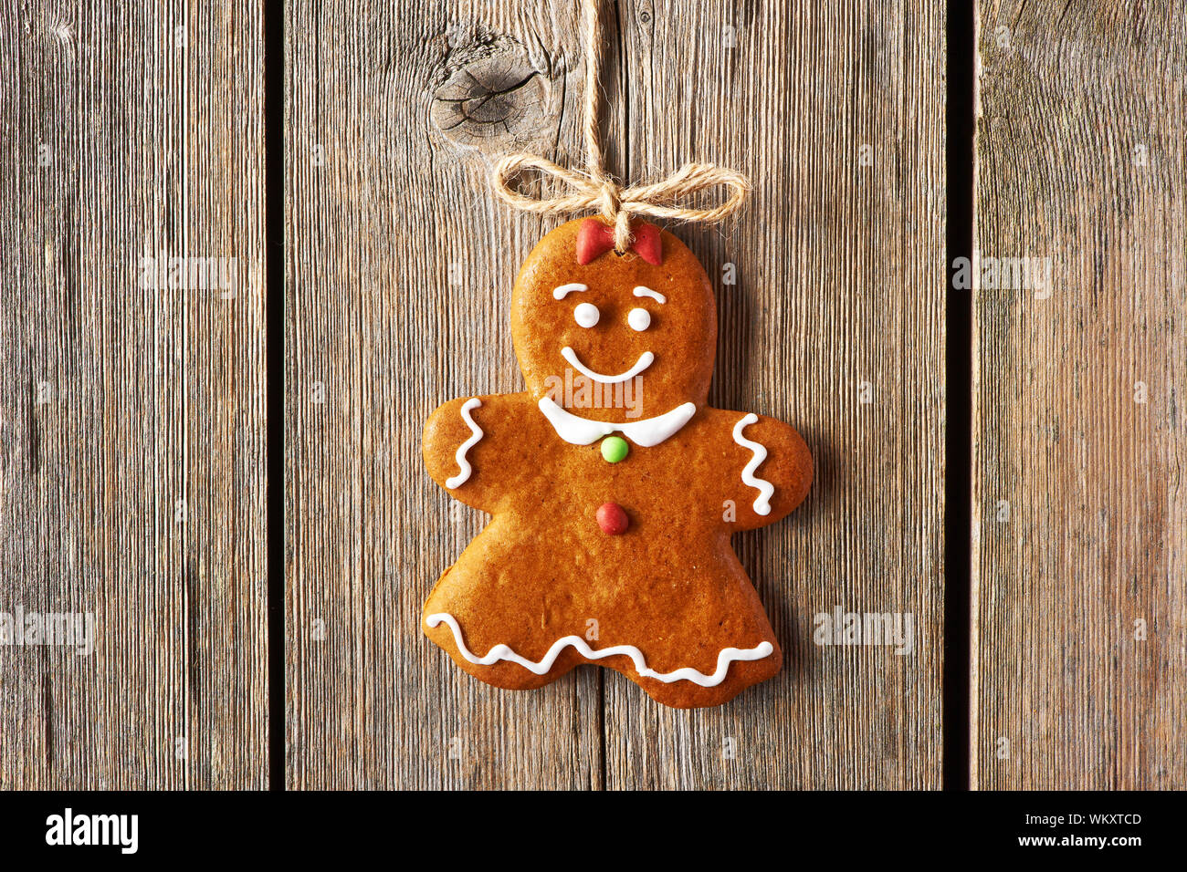 Christmas homemade gingerbread girl over wooden background Stock Photo ...