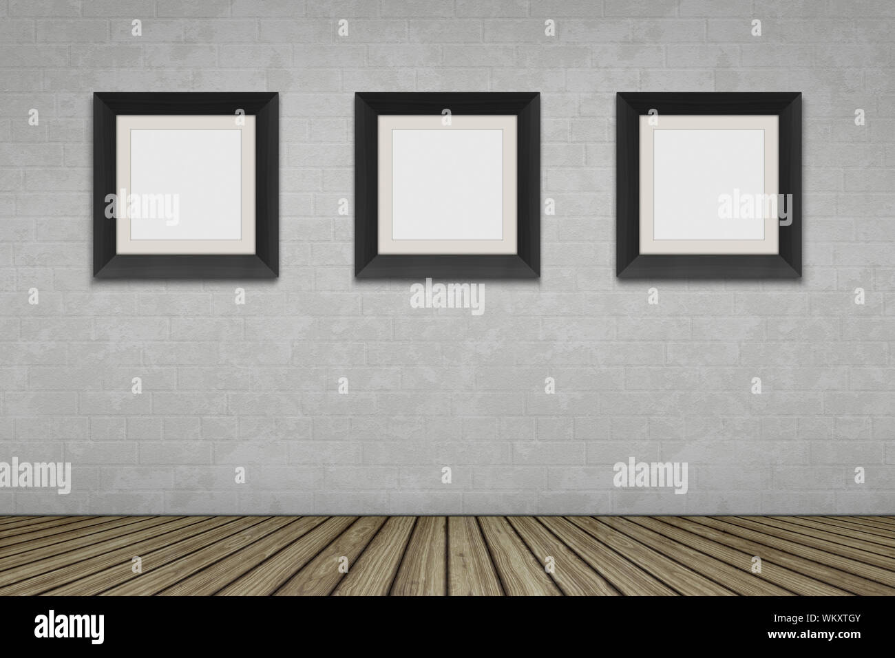 An empty room with three picture frames Stock Photo - Alamy