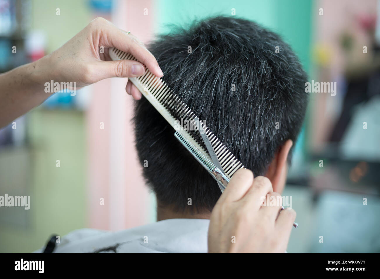 Man getting haircut hi-res stock photography and images - Alamy