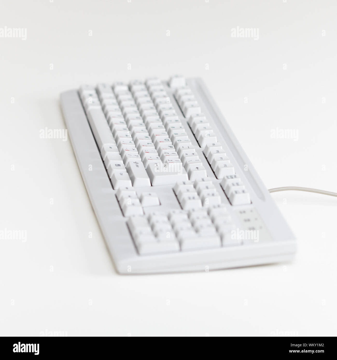 The computer keyboard lies on a table surface Stock Photo - Alamy