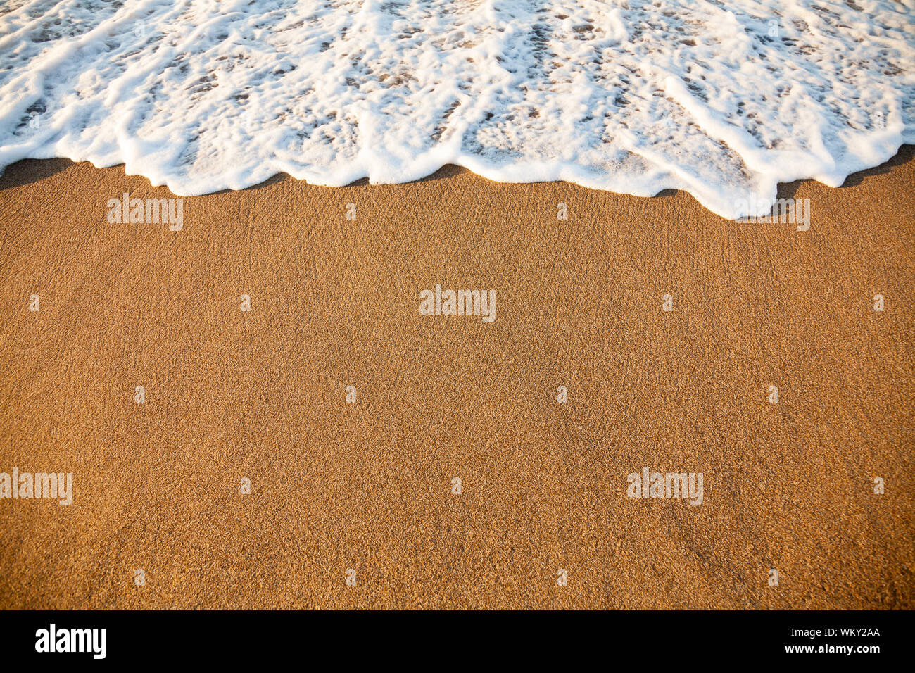 Wave washing onto beach hi-res stock photography and images - Alamy
