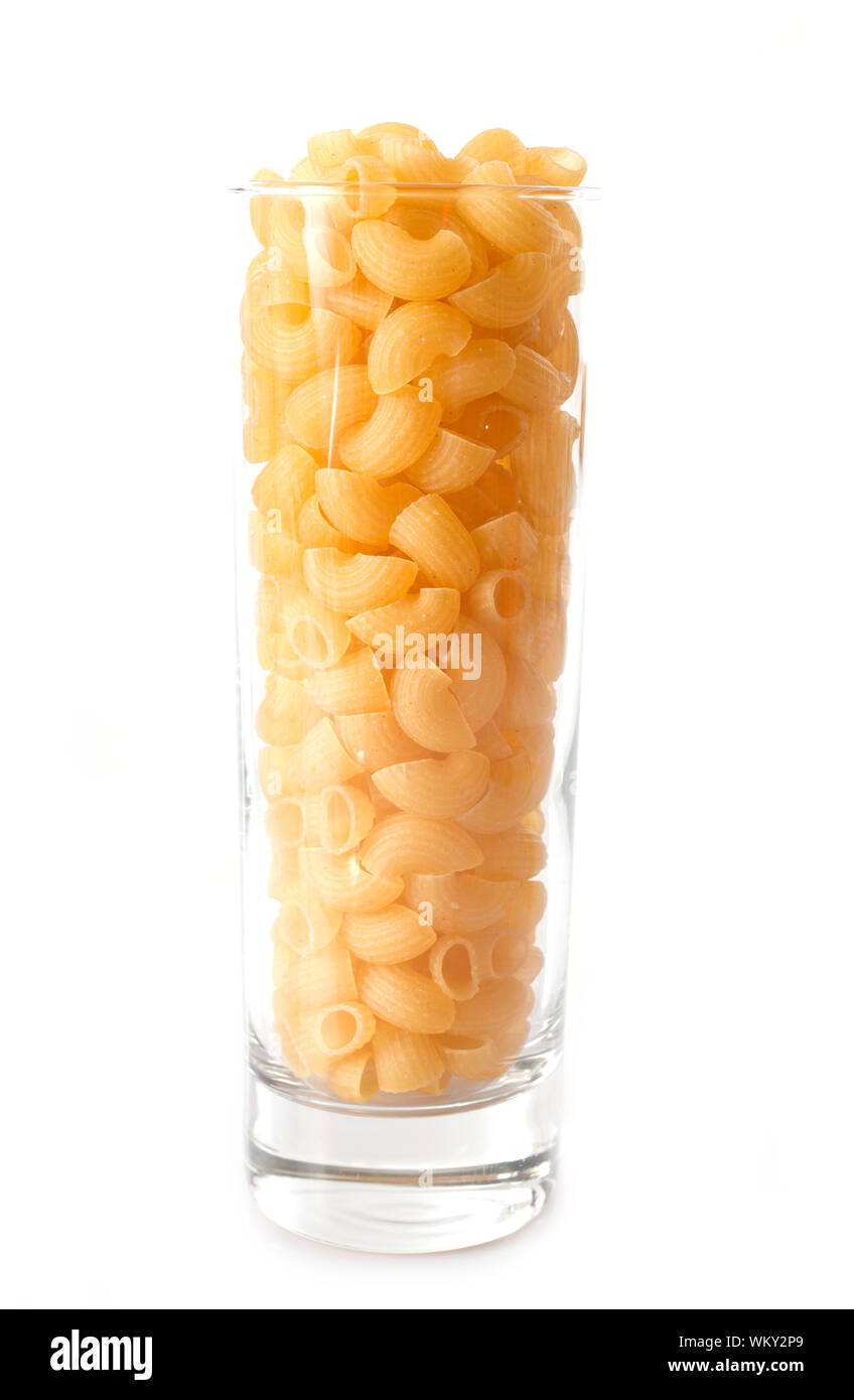 pasta shells in front of white background Stock Photo - Alamy
