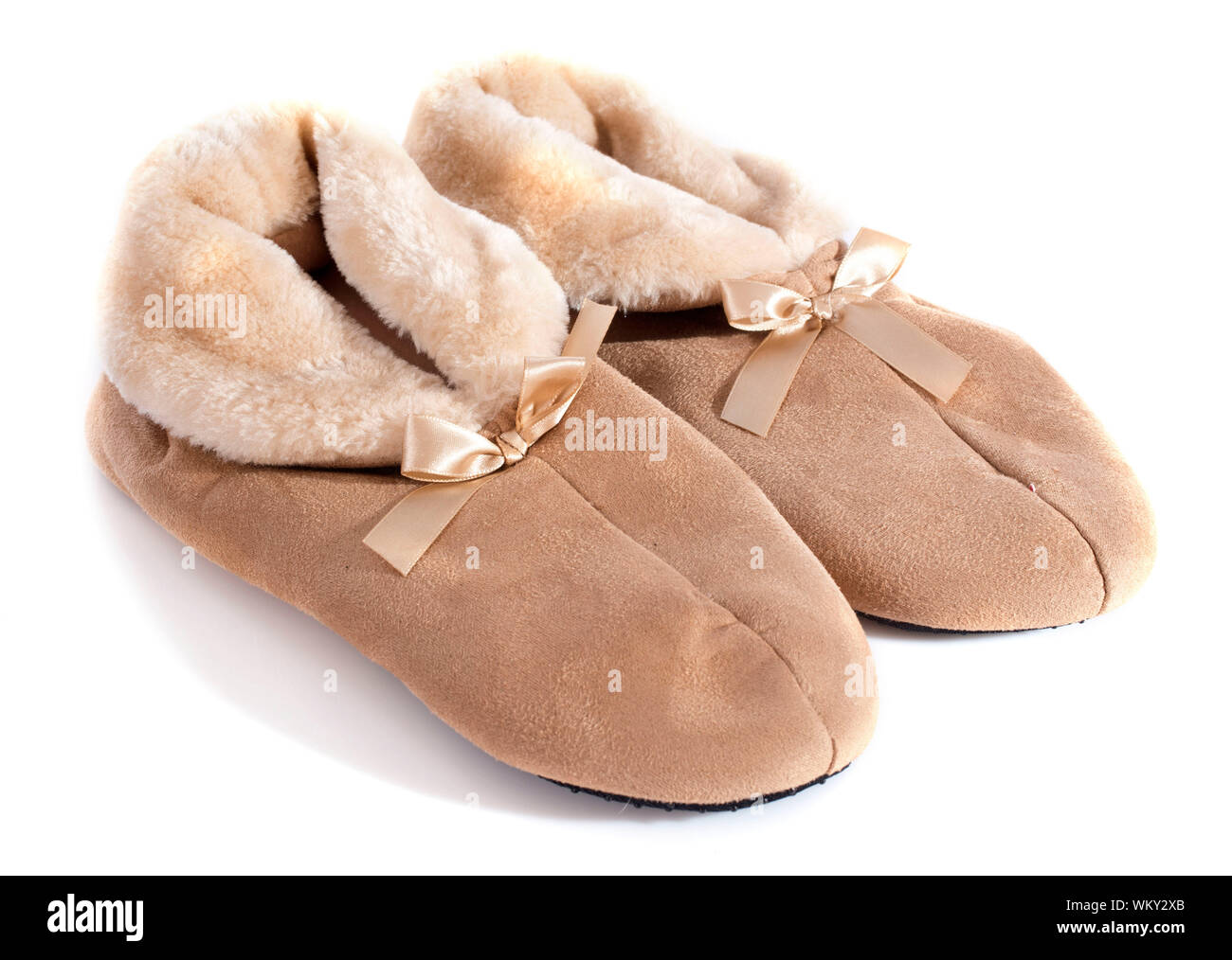 fur slippers in front of white background Stock Photo - Alamy