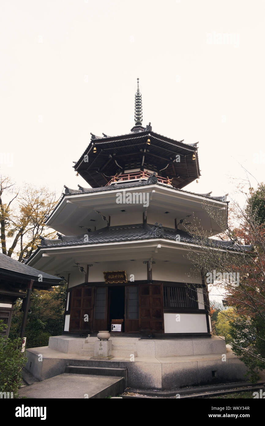 Myoho Temple with octagonal building and triple tower Stock Photo - Alamy