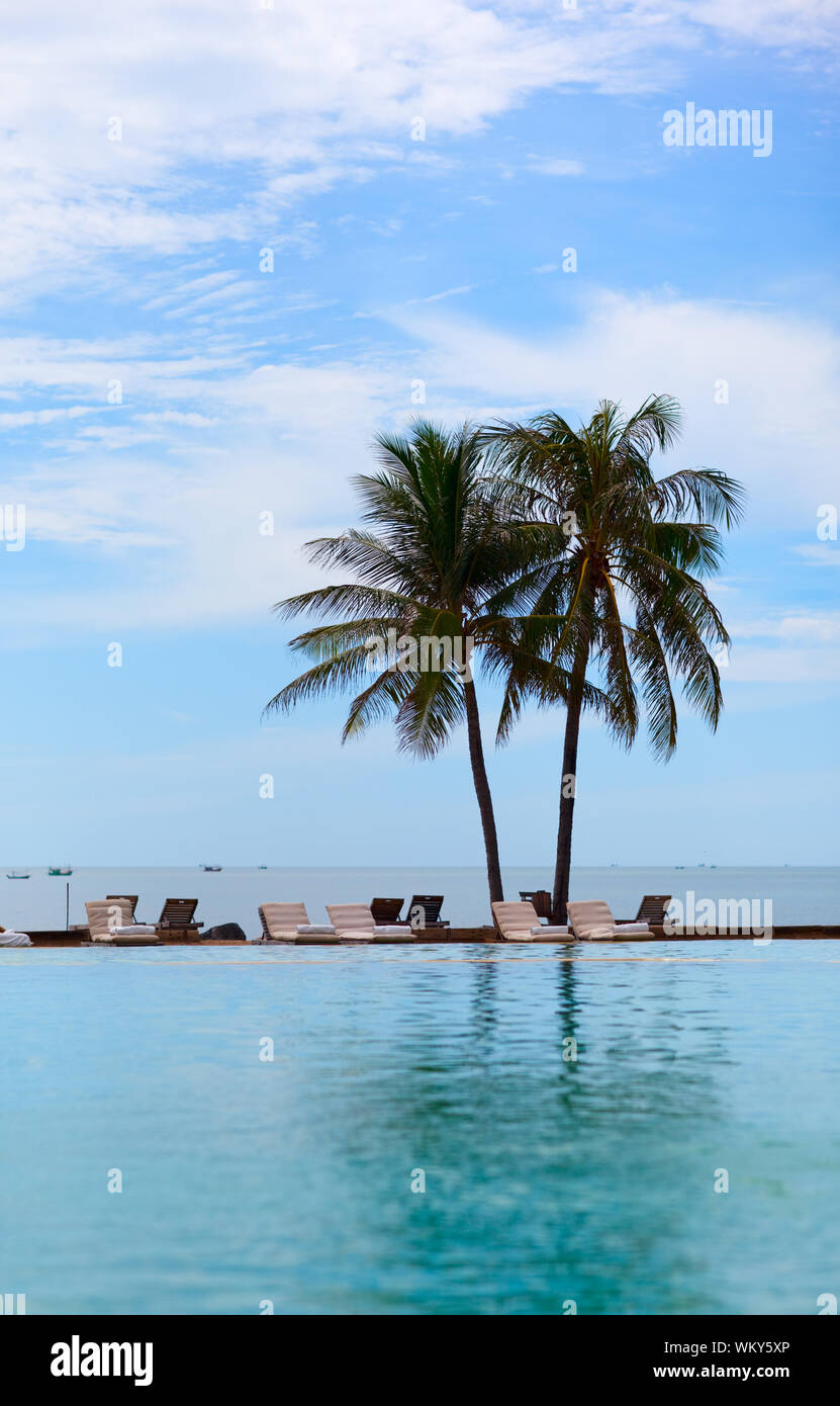 Beautiful swimming pool in luxury tropical resort Stock Photo - Alamy