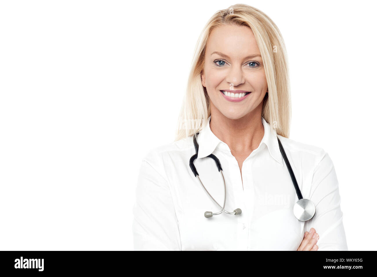 Beautiful female physician with folded arms Stock Photo - Alamy