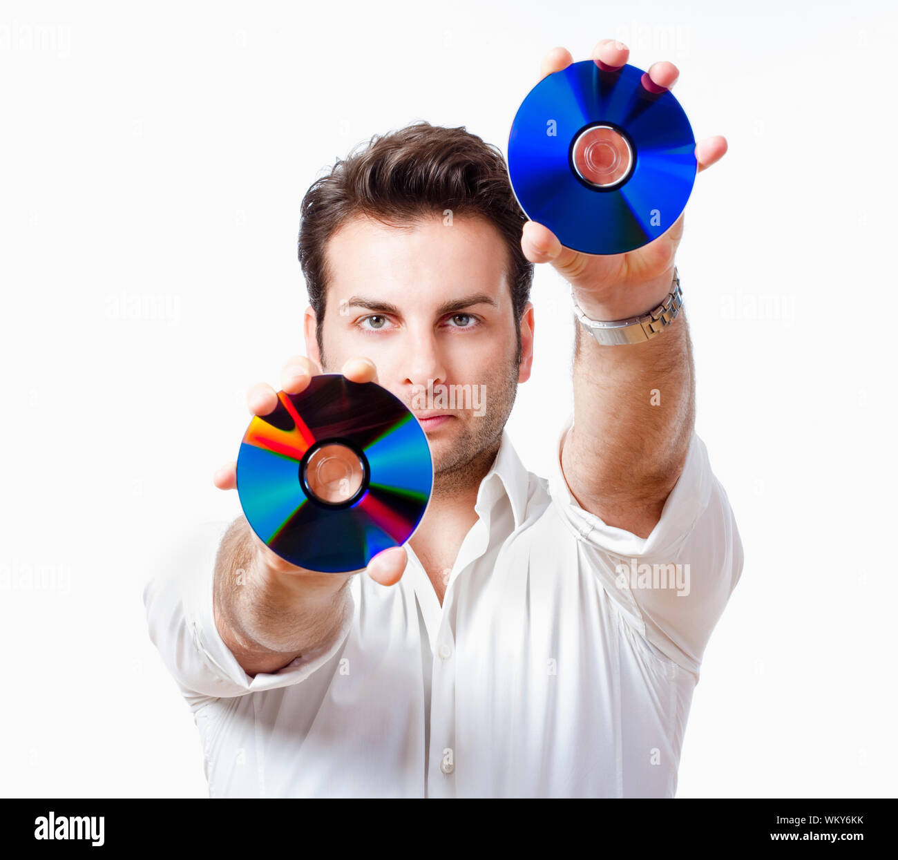 man in white shirt standing holding CD - isolated on white Stock Photo ...