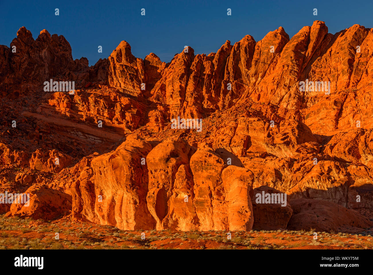 Evening light on sandstone rock spires in the Seven Sisters area ...
