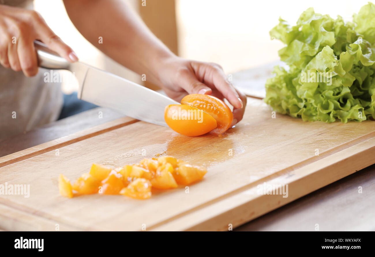 Professional chef chopping spring onions hi-res stock photography and ...