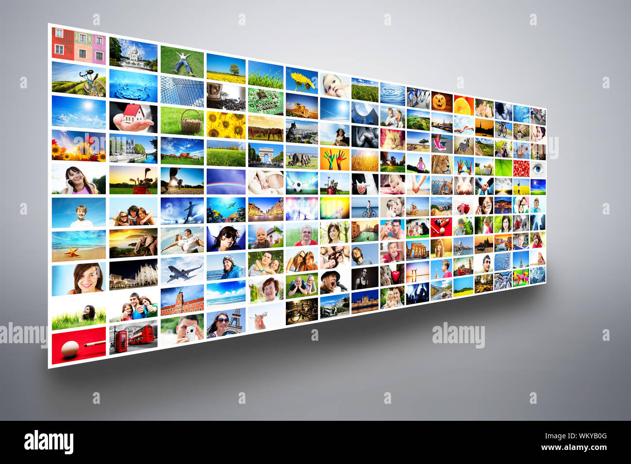Pictures display on wide modern monitors, screens forming a big ...