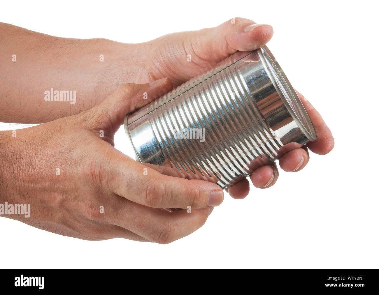 Food can in hand isolated on white background Stock Photo - Alamy