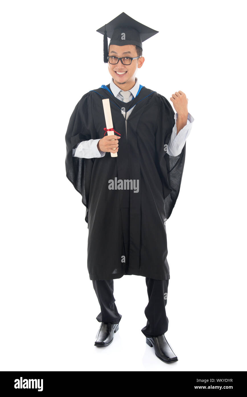 Excited full length Southeast Asian university student in graduation ...
