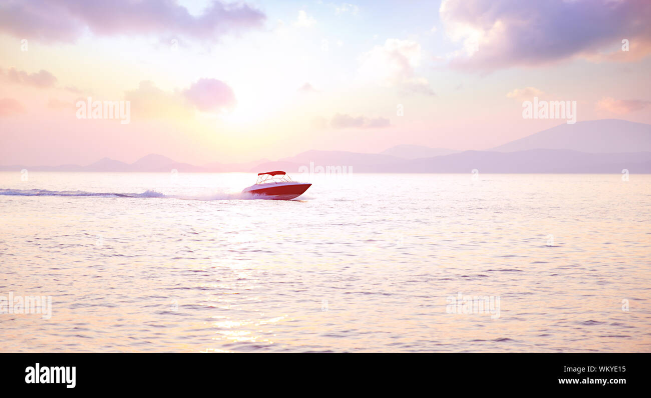 Luxury motorboat on the sea in mild pink sunset light, active lifestyle ...