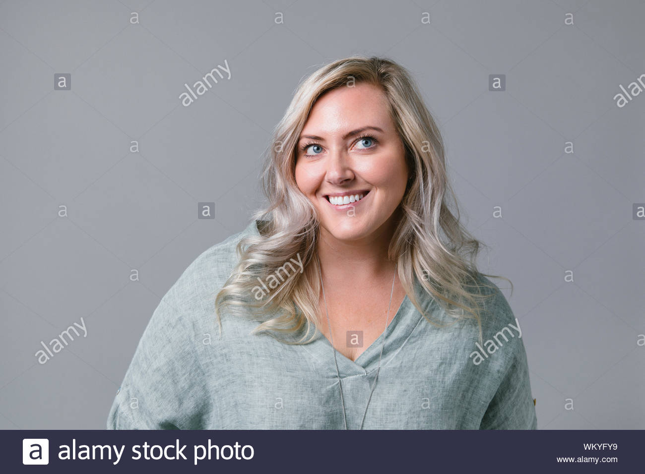 Mischievous smile hi-res stock photography and images - Alamy