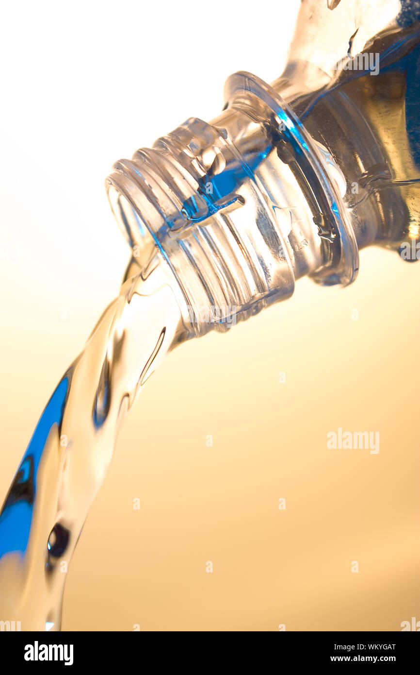 stream of water flows from the bottle Stock Photo - Alamy