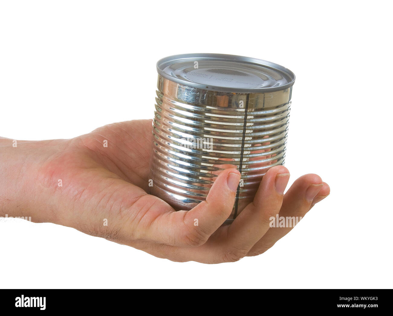 Food can in hand isolated on white background Stock Photo - Alamy