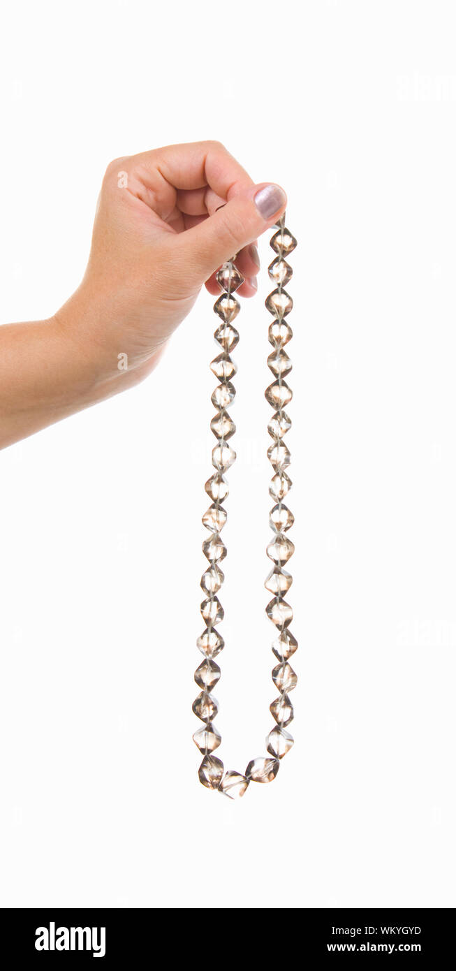 Beads in hand isolated on white background Stock Photo - Alamy