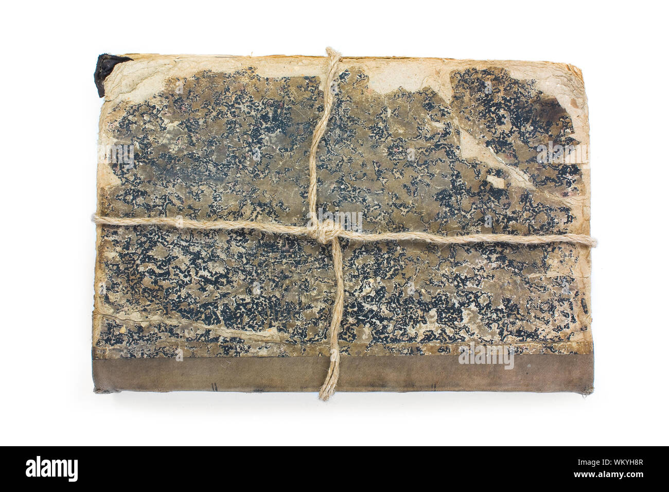 An old book with a crumpled sheet and hardcover isolated on white ...