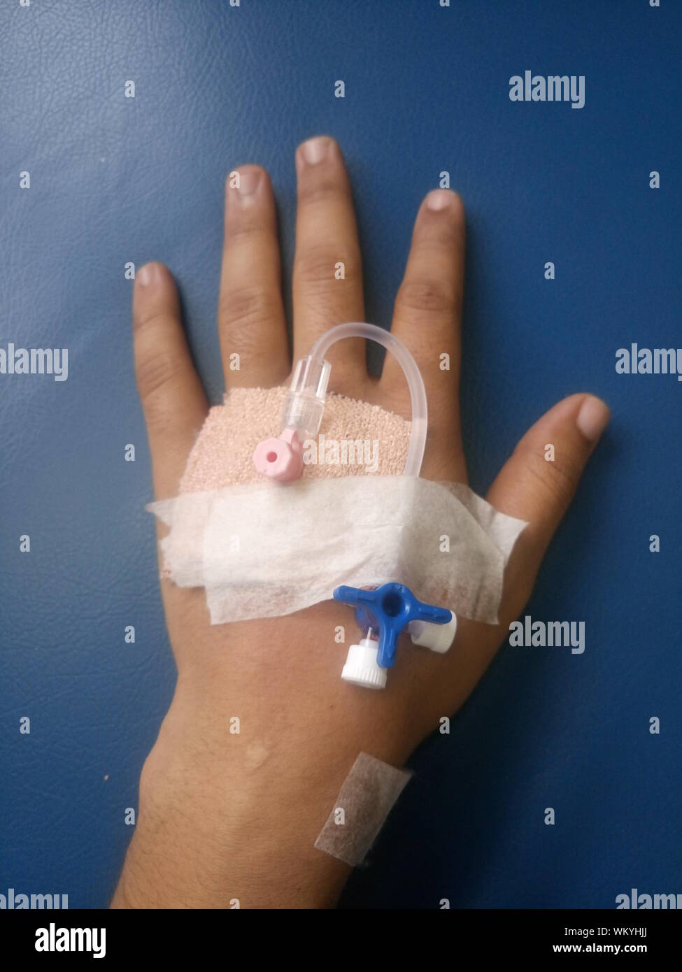 Human hand on iv drip hi-res stock photography and images - Alamy