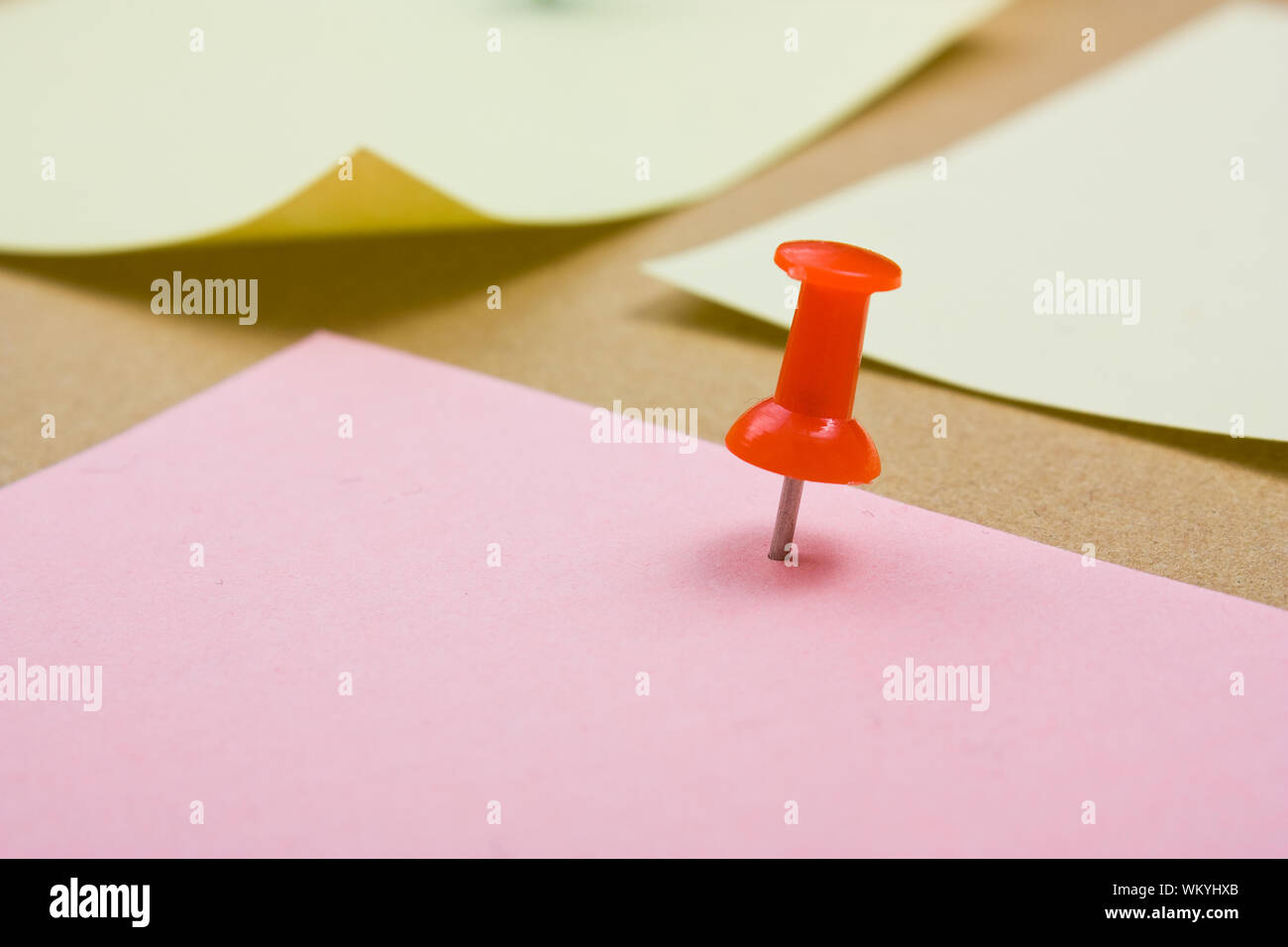 Bulletin board with a sheet on the buttons Stock Photo - Alamy