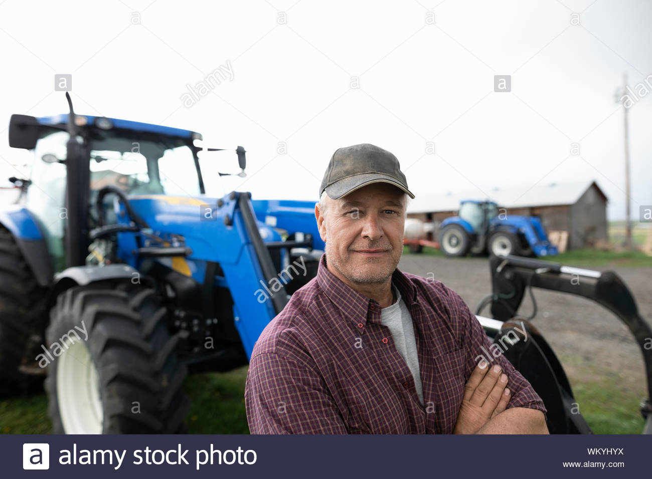 Farmer posing with tractor hi-res stock photography and images - Alamy