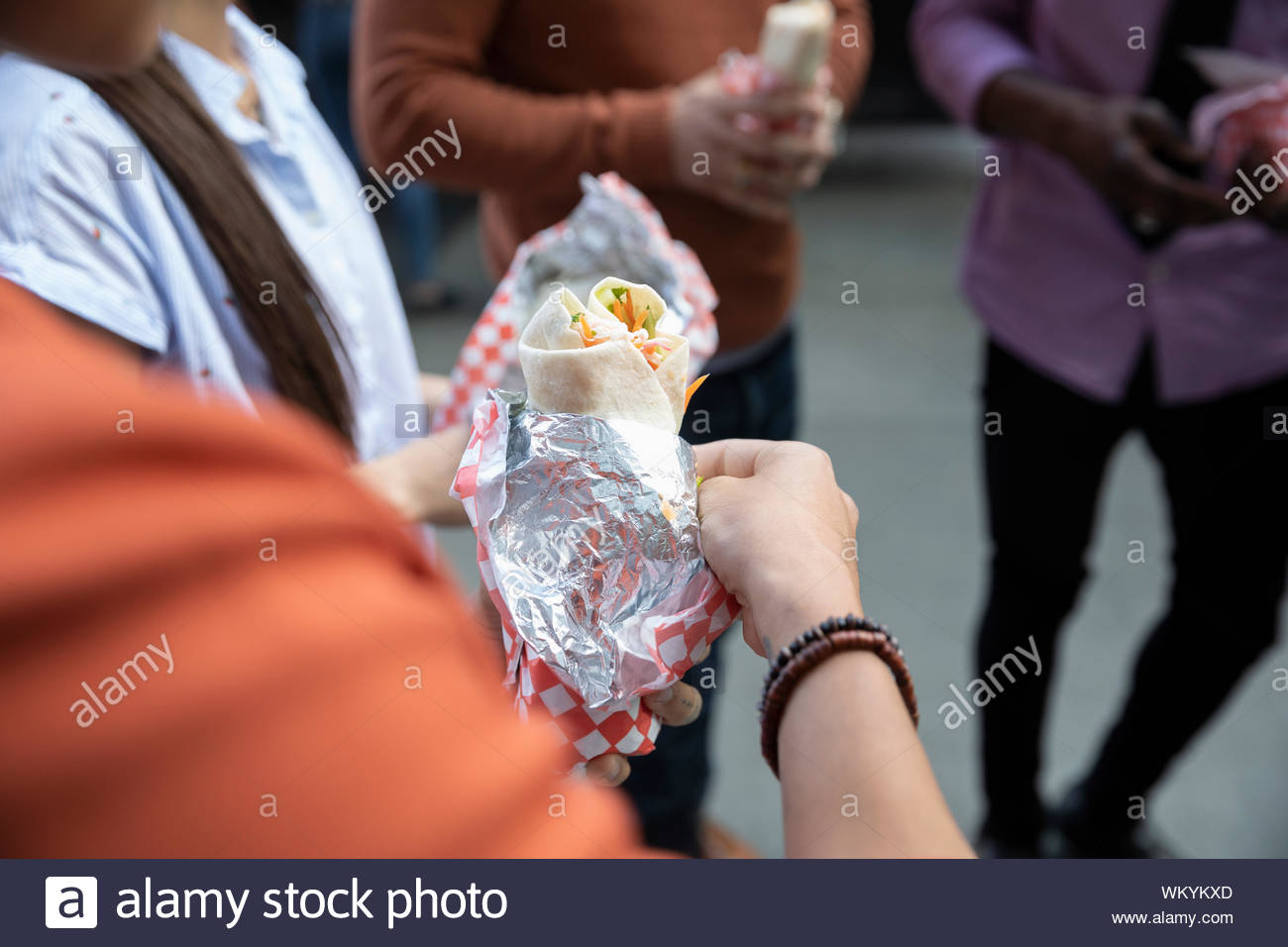 Four people eating hi-res stock photography and images - Alamy