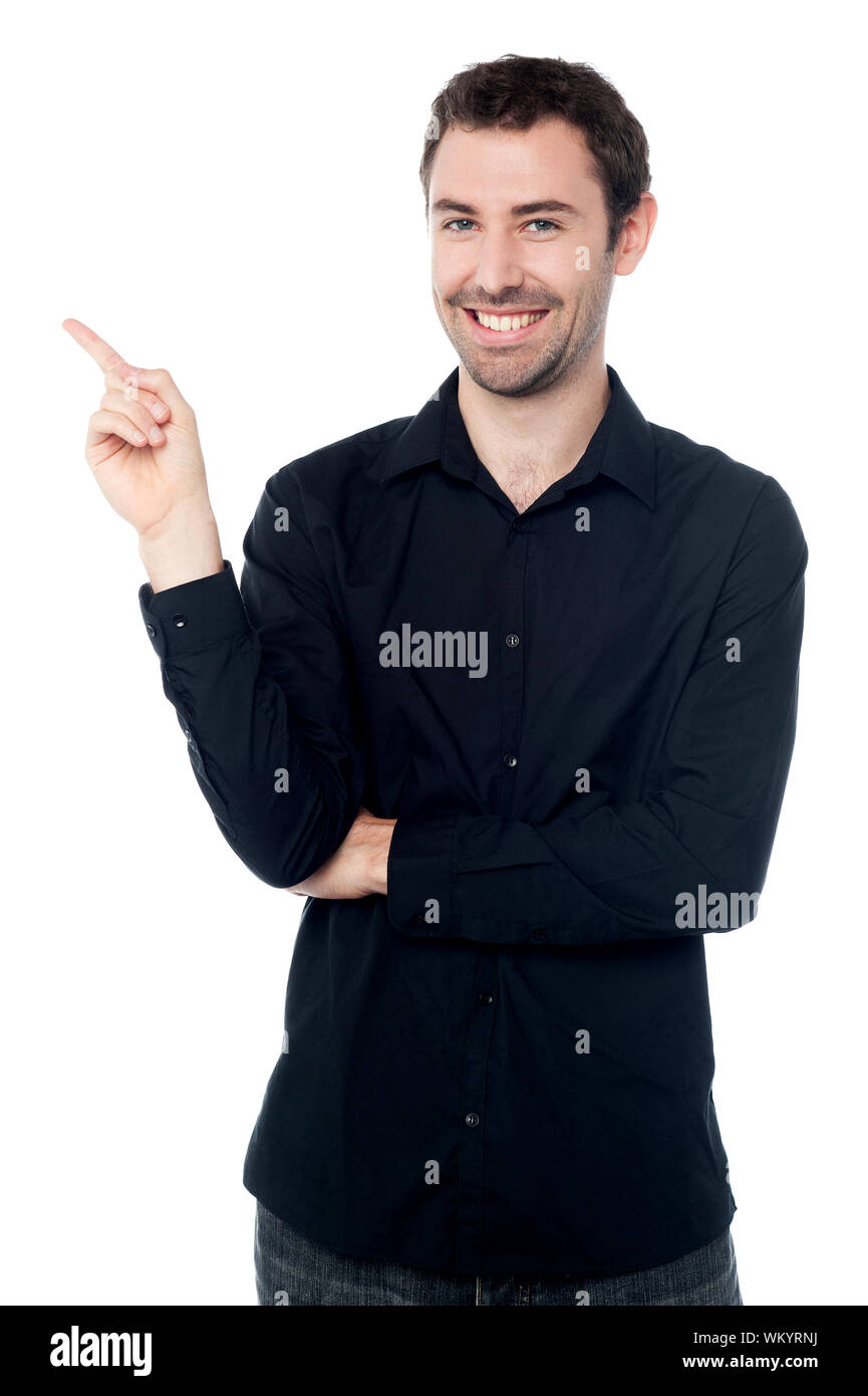 Guy pointing away facing camera hi-res stock photography and images - Alamy